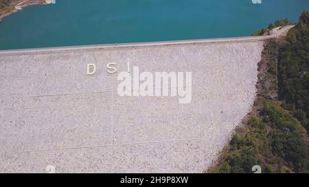Alanya Dim dam. Clip. Top view of large dam holding back water in ...