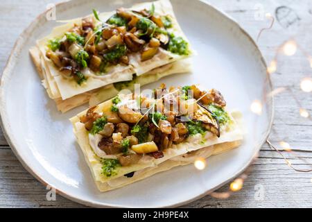 Vegan filo pastry canapes with aubergine and coriander sauce Stock ...
