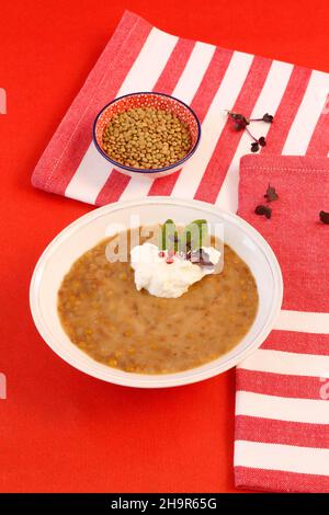 Swabian cuisine, Alblinsen soup with cream topping, soup bowl, plate ...