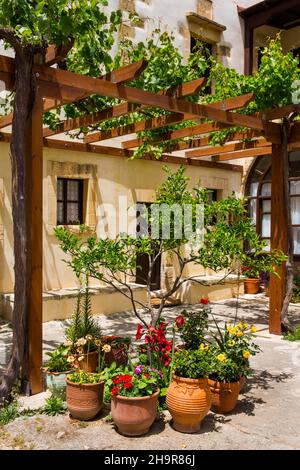 Moni Gonias perched directly on the sea above a cliff, Crete, Kolimbari ...