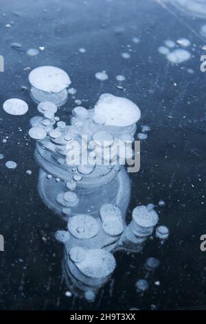 Methane bubbles under the frozen surface of Lake Baikal, Russia Stock ...