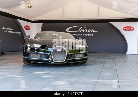 Bugatti Chiron car on display in showcase, night, Strasbourg, Alsace ...