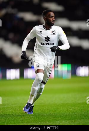 Milton Keynes Dons' Mohamed Eisa (right) celebrates scoring their side ...