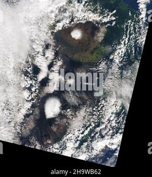 Snow on the peaks of Mauna Kea and Mauna Loa, Hawaii, from a low ...