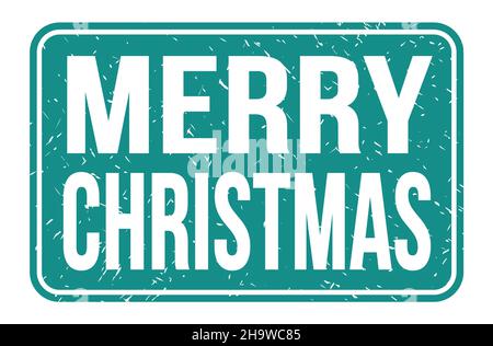 MERRY CHRISTMAS, words written on green grungy stamp sign Stock Photo ...
