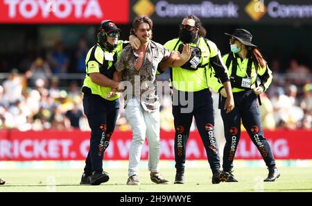 A Pitch Invader enters the field during day two of the first Ashes test ...