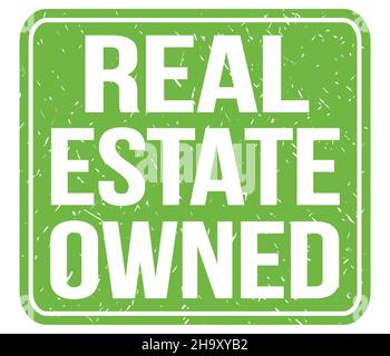 REAL ESTATE OWNED, words written on red stamp sign Stock Photo - Alamy