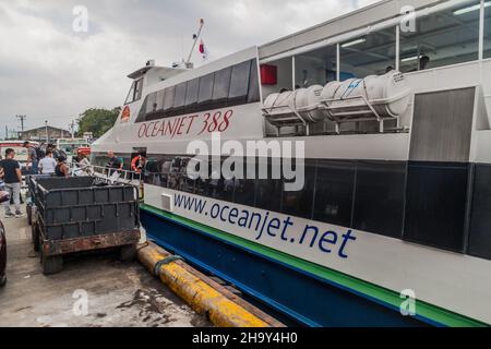 A large passenger ferry in The Philippines Stock Photo - Alamy