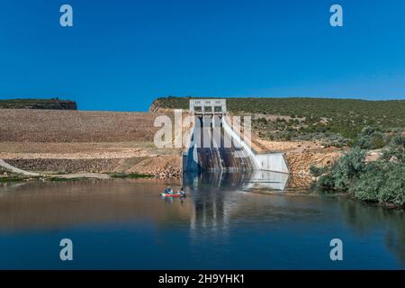Anglers at boat below spillway at Alcova Dam, built 1935-1938, view ...