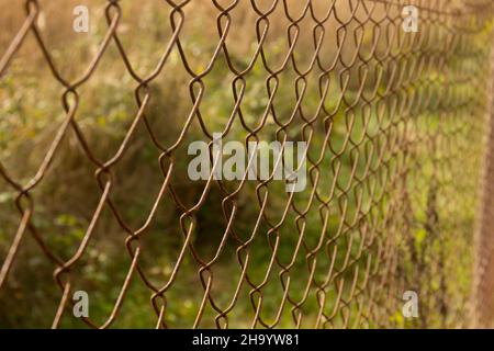 Rusty wire and fence for separating fields and plots of land Stock ...