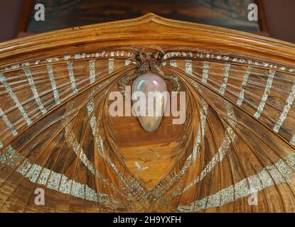 Flying moth depicted in the detail of the Art Nouveau bed 'Aube et ...