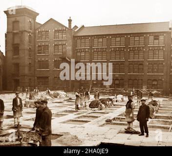 Soaking and liming, leather production, Victorian period Stock Photo ...