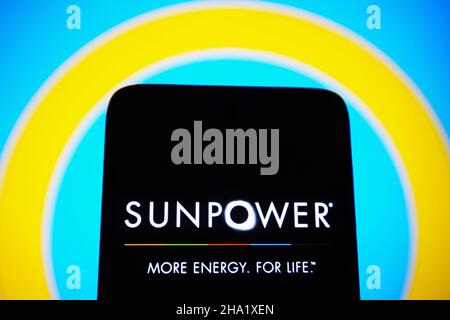 In this photo illustration, the SunPower Corporation logo is displayed on a smartphone screen ...