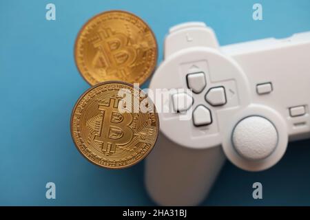 Crypto gaming concept. Video game controller with a bitcoin ...