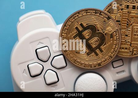 Crypto gaming concept. Video game controller with a bitcoin ...