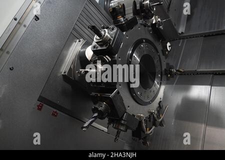 motorized turrets in a CNC lathe Stock Photo - Alamy