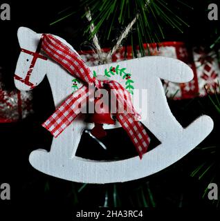Christmas ornament made of red adornment on wooden background Stock ...
