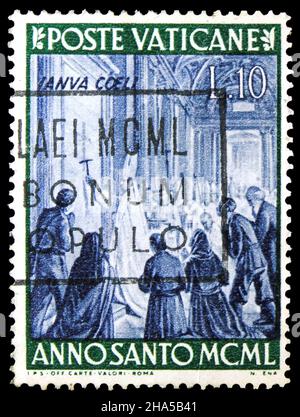 VATICAN - CIRCA 1949: a stamp printed in Vatican shows Basilica of St ...