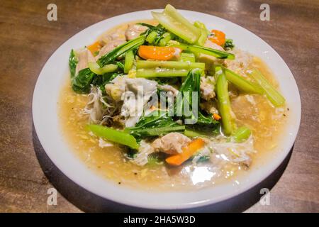 Rice noodles in egg gravy, also know as Wat Tan Hor, is a Cantonese ...