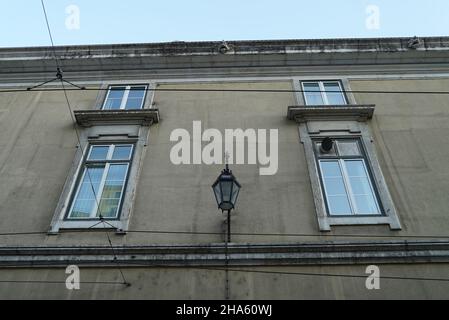 A low angle shot of old historic houses/building under the cloudy sky ...