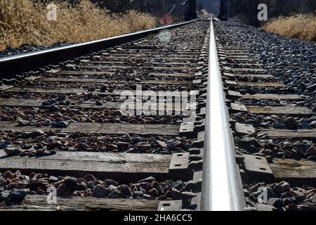 Low angle view of empty railroad train tracks for graphic resources ...