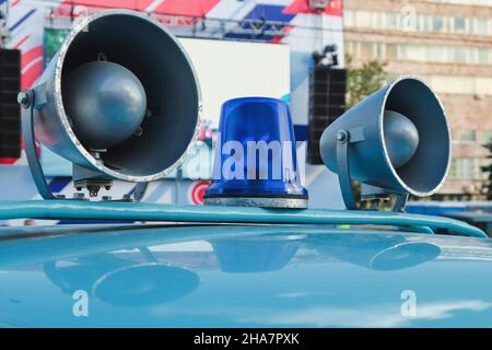 Details of retro police car with a megaphone and flashing blue siren ...