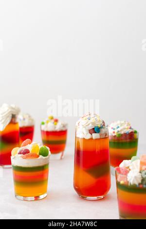 Multi-colored marmalade on the table. Jelly candy with sugar on top ...