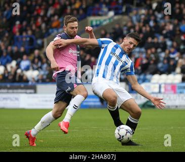 Huddersfield Town's Matty Pearson and Coventry City's Ellis Simms ...