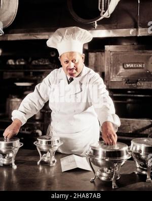 1920s 1930s SERIOUS FRENCH CHEF IN KITCHEN WITH SMALL SILVER CHAFING ...