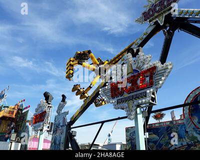 Rocket carousel on Wilbasen funfair Stock Photo - Alamy