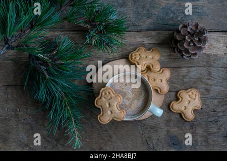 noel cookies, Cappuccino or Latte coffee and gingerbread man cookies on ...