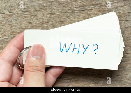 Man hold the flash card with handwriting word vaccine on wood ...