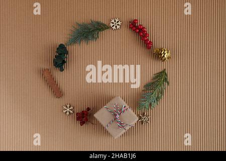 Christmas round frame made of winter decorations on black background ...