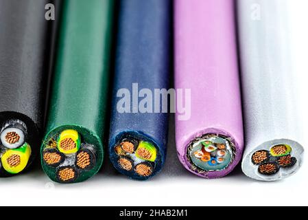 Macro photo of the cross section of various electric cables, isolated ...