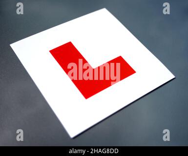 File photo dated 28/07/09 of a learner driver ripping up her L plate ...