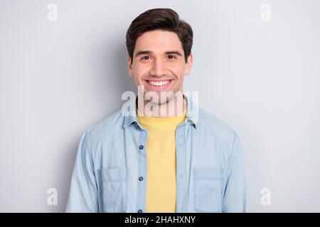 Photo of pretty sweet guy wear purple t-shirt dancing empty space ...