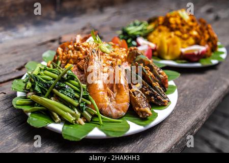 Popular Filipino food Seafood with Java rice at Restaurant Stock Photo ...