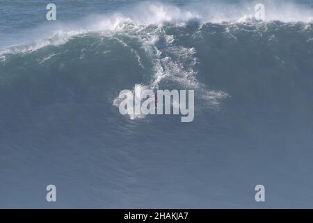 Lucas "Chumbo" Chianca, from Brazil, rides a wave during the Nazare Big ...
