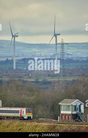 Frodsham with a local train Transport for Wales class 175 leaving the ...