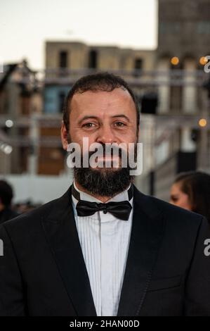 Palestinian actor Ali Suliman walks the red carpet as he arrives to the ...
