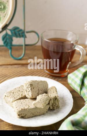 Tasty halva with tea on the table Stock Photo - Alamy