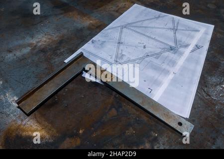 the workplace of a locksmith welder with different tools at the factory ...