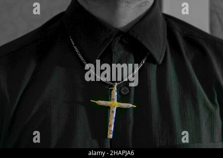 A closeup shot of a cross necklace made of wooden beads Stock Photo - Alamy
