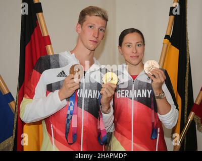 Gold medalist Florian Wellbrock of Germany poses on the podium after ...