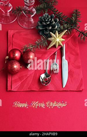 Christmas background with napkin, red baubles, ribbon and a candy cane ...