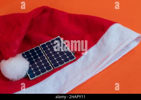 Christmas Santa Claus hat with photovoltaic solar panel and lamp ...