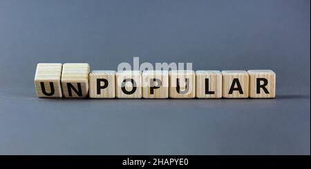 Popular or unpopular symbol. Turned wooden cubes and changed the word ...