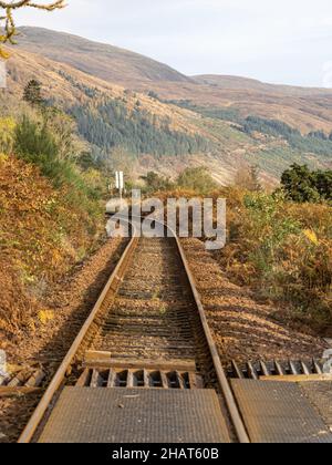 Railway line from Kyle of Lochalsh to Inverness crossing the A890 at ...