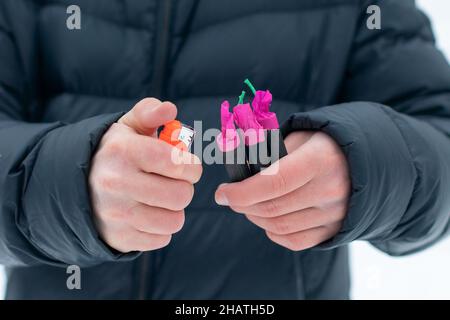 Guy Sets Fire to the Flash Noise Firecracker Outdoors in Winter at ...