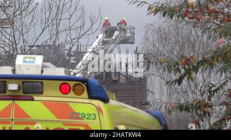 Firefighters at the scene in Grovelands Road, Reading, where one person ...
